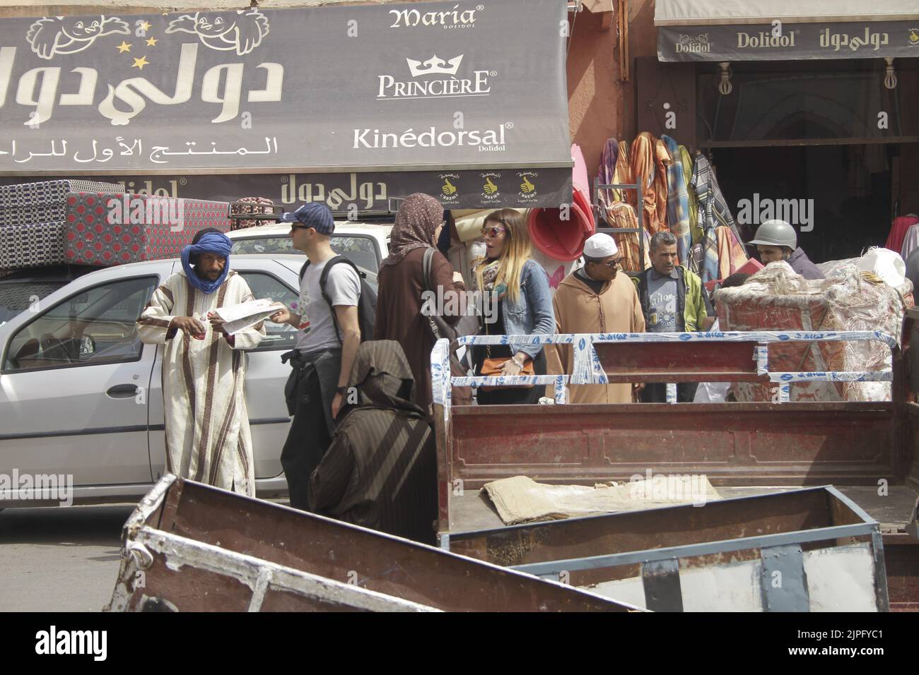 people of Marrakech walk around the market Stock Photo - Alamy
