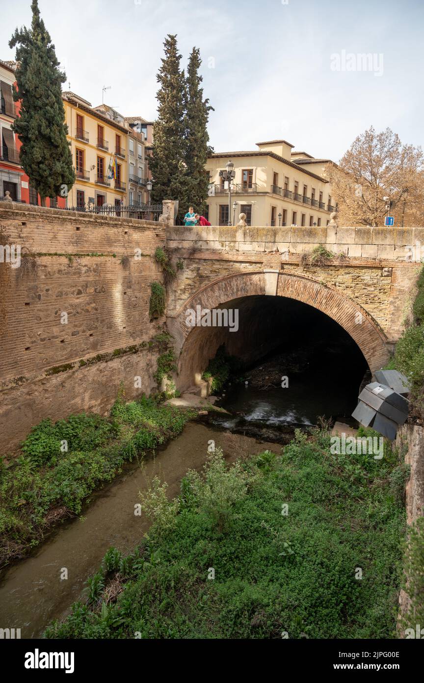 Walking in old central part of world heritage city Granada, Andalusia ...