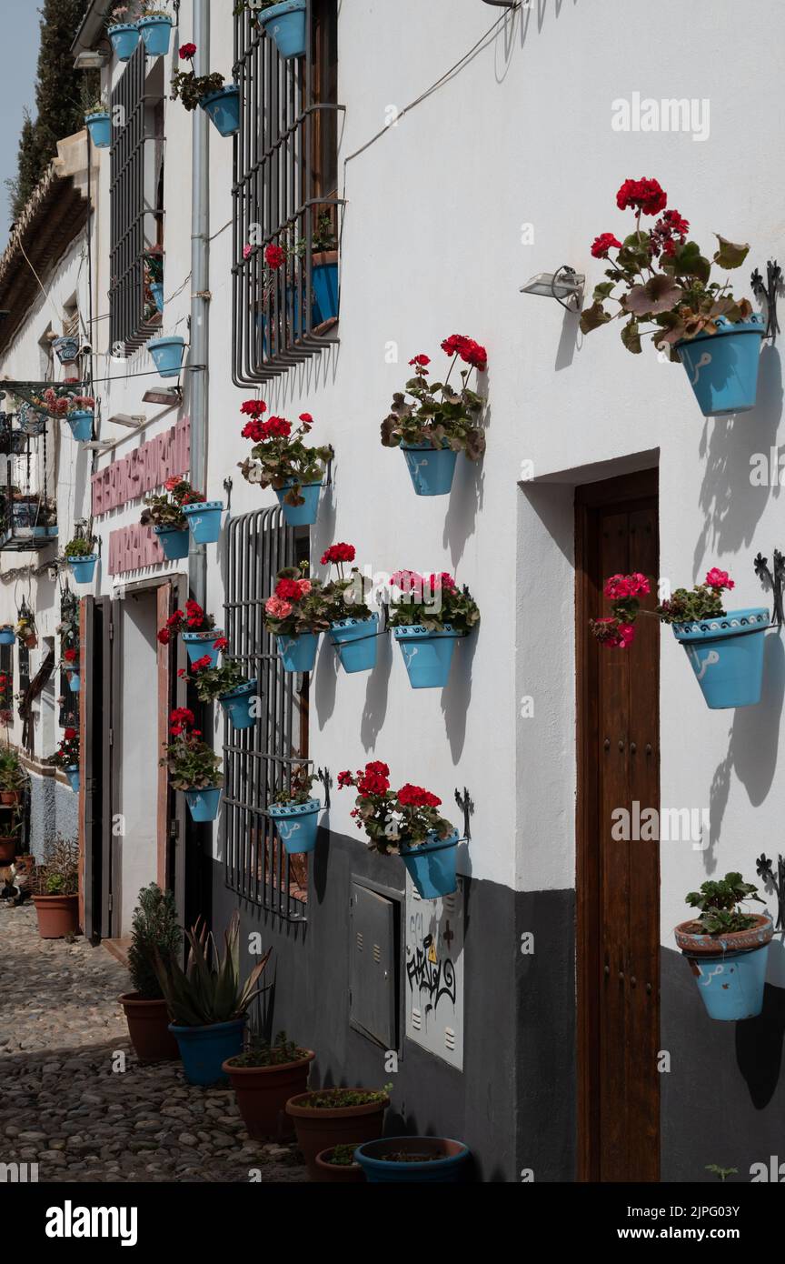 Walking in old central part of world heritage city Granada, Andalusia ...