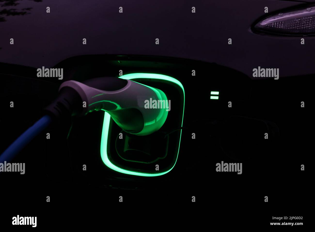 Ev charging cable plugged in hi-res stock photography and images - Alamy