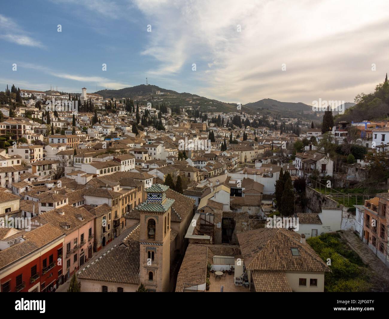 Aerial panoramic view on buildings, old district, mountains and palace ...