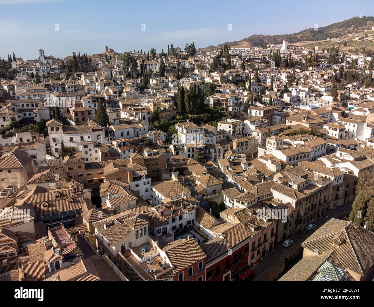 Aerial panoramic view on buildings, old district, mountains and palace ...
