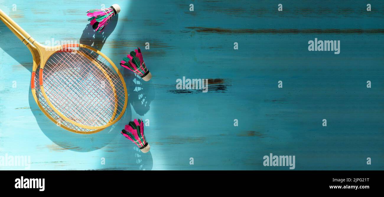 Conceptual idea with badminton rackets and a shuttlecock bird, on a ...