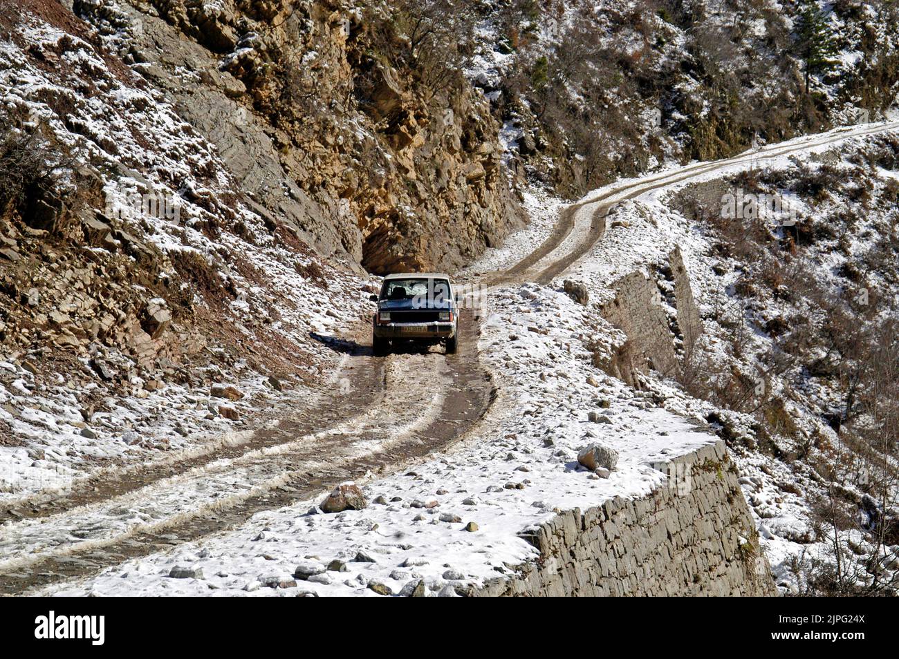 Winter snow on mountain road, northern Albania Stock Photo - Alamy