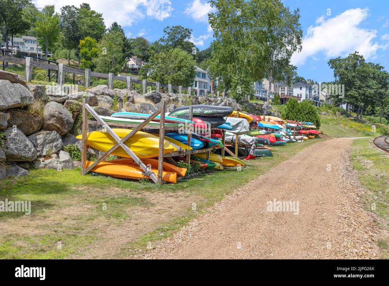 A beautiful shot of canoes and kayaks at the shore of Lake ...