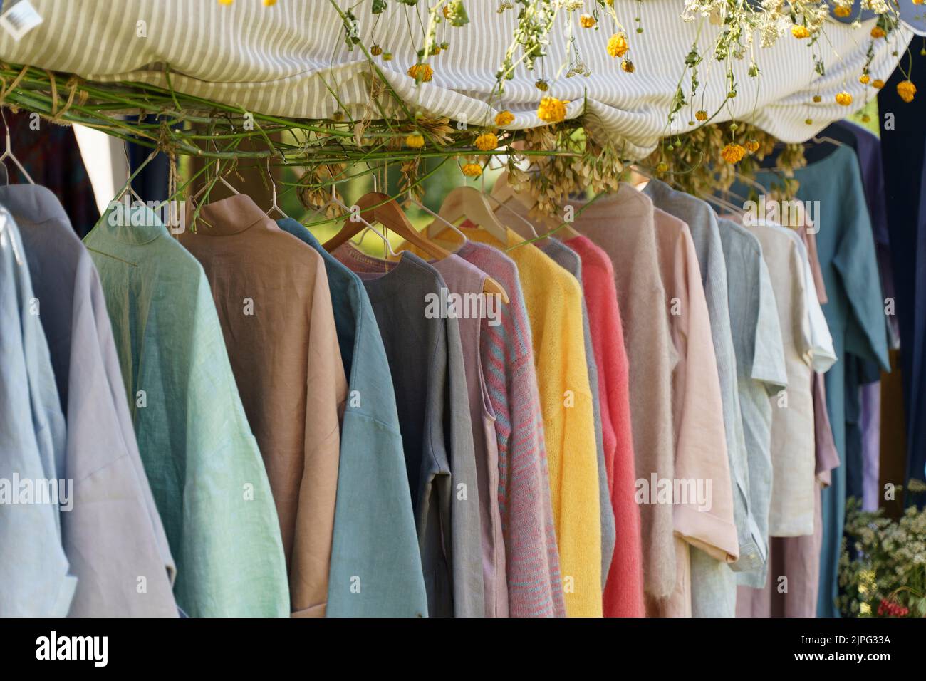 Organic eco clothes on a hanger. Home-made clothing from natural and ...