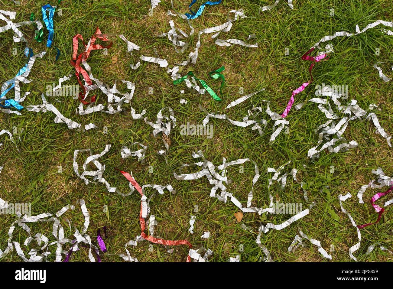 Plastic pollution after a party, event, celebration. Plastic confetti ...