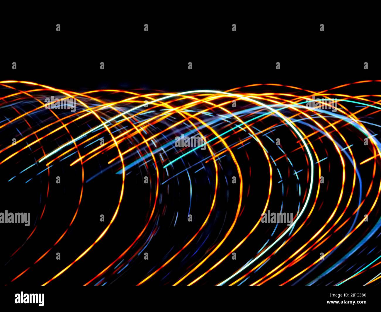 Colorful light trails with motion effect. Abstract background. Shows ...