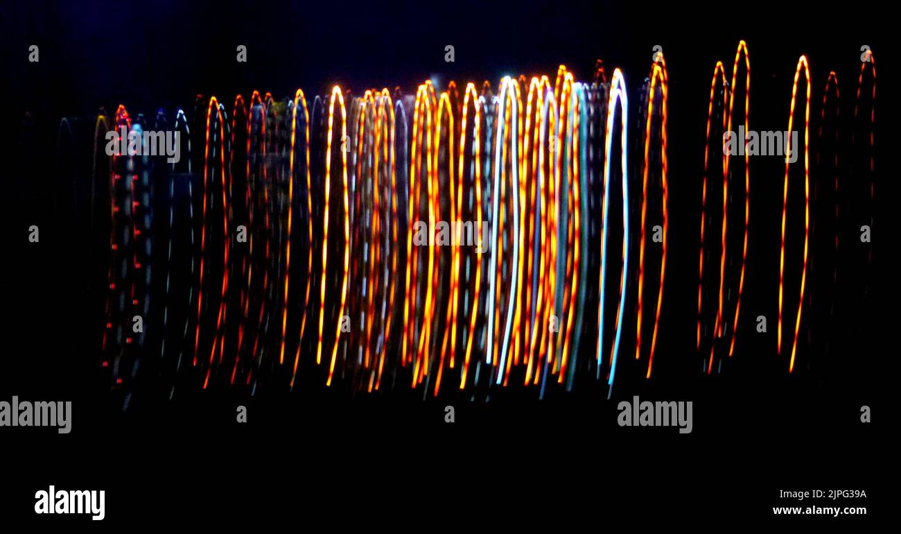 Colorful light trails with motion effect. Abstract background. Shows ...