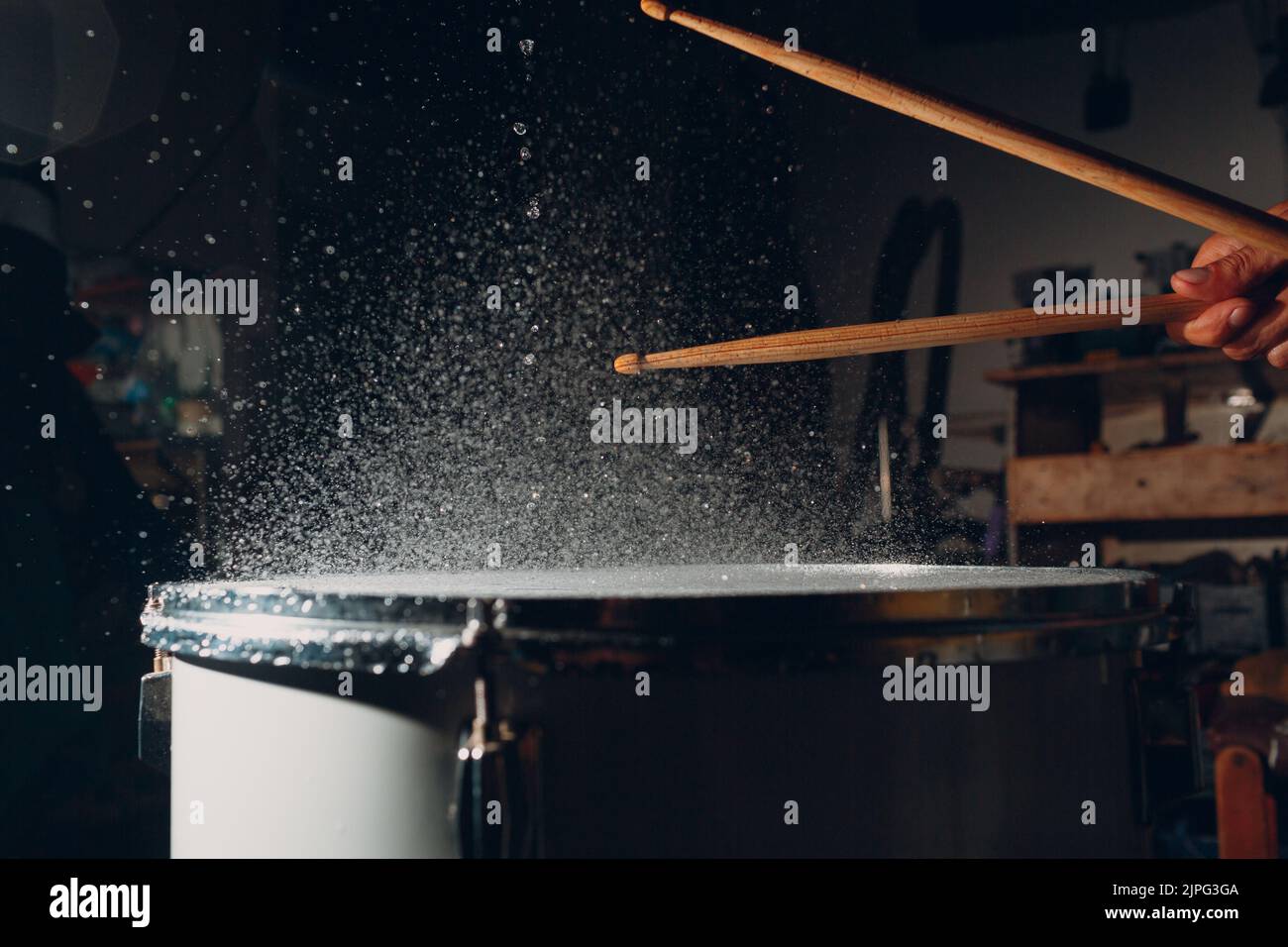Close up drum sticks drumming hit beat rhythm on drum surface with ...