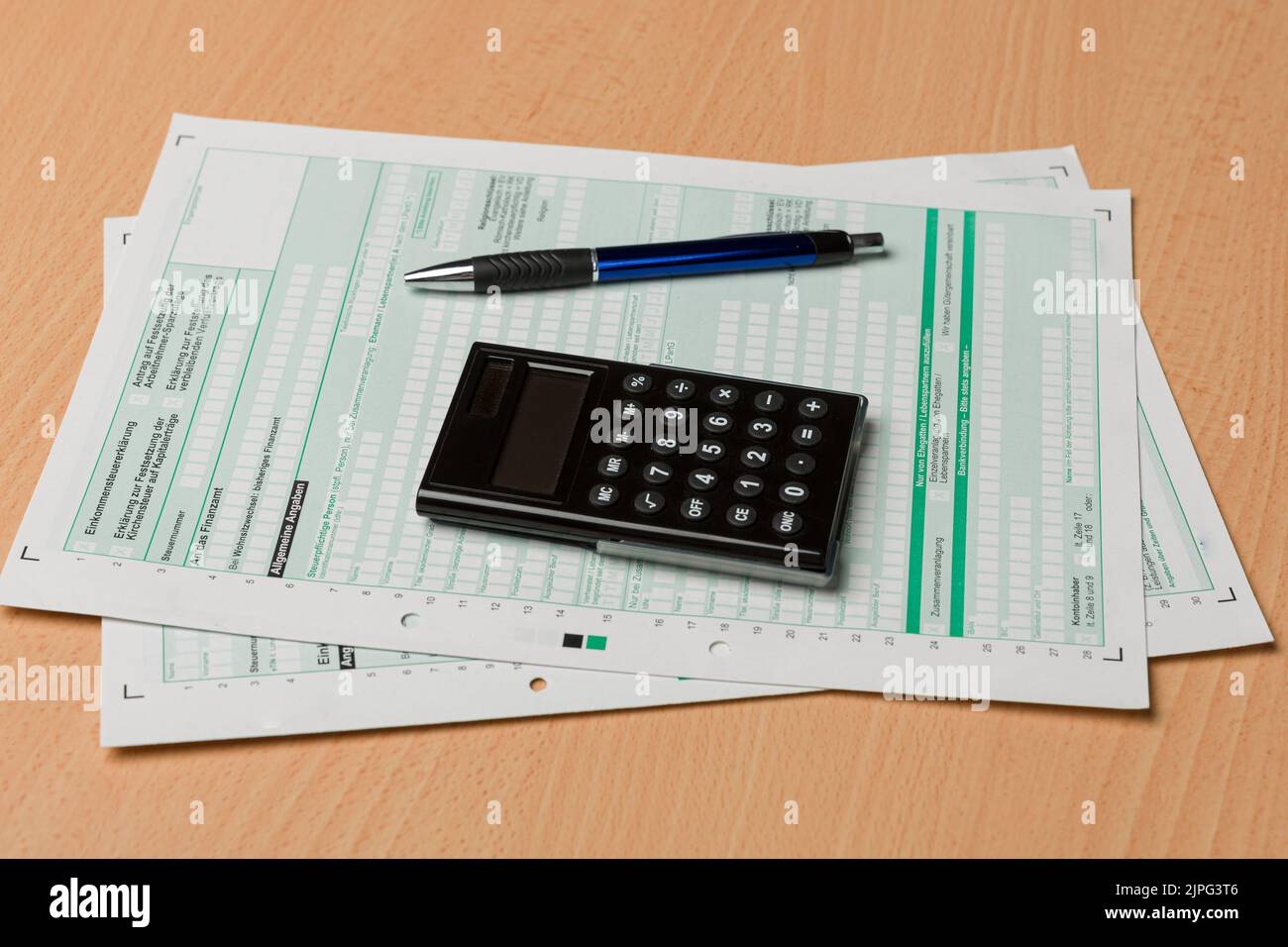 Tax forms calculator hi-res stock photography and images - Alamy
