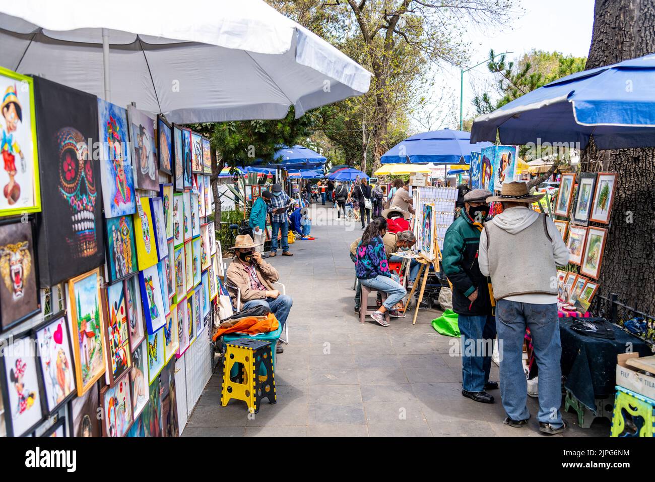 Painters and artists selling their artwork in a park in Coyoacan ...