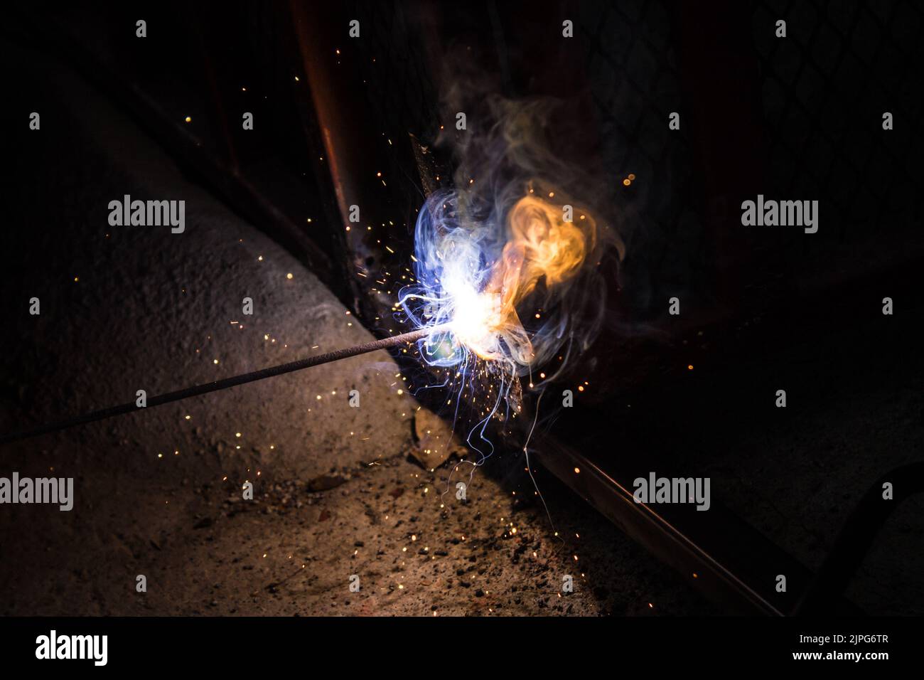 A close-up in the world of rod welding Stock Photo - Alamy