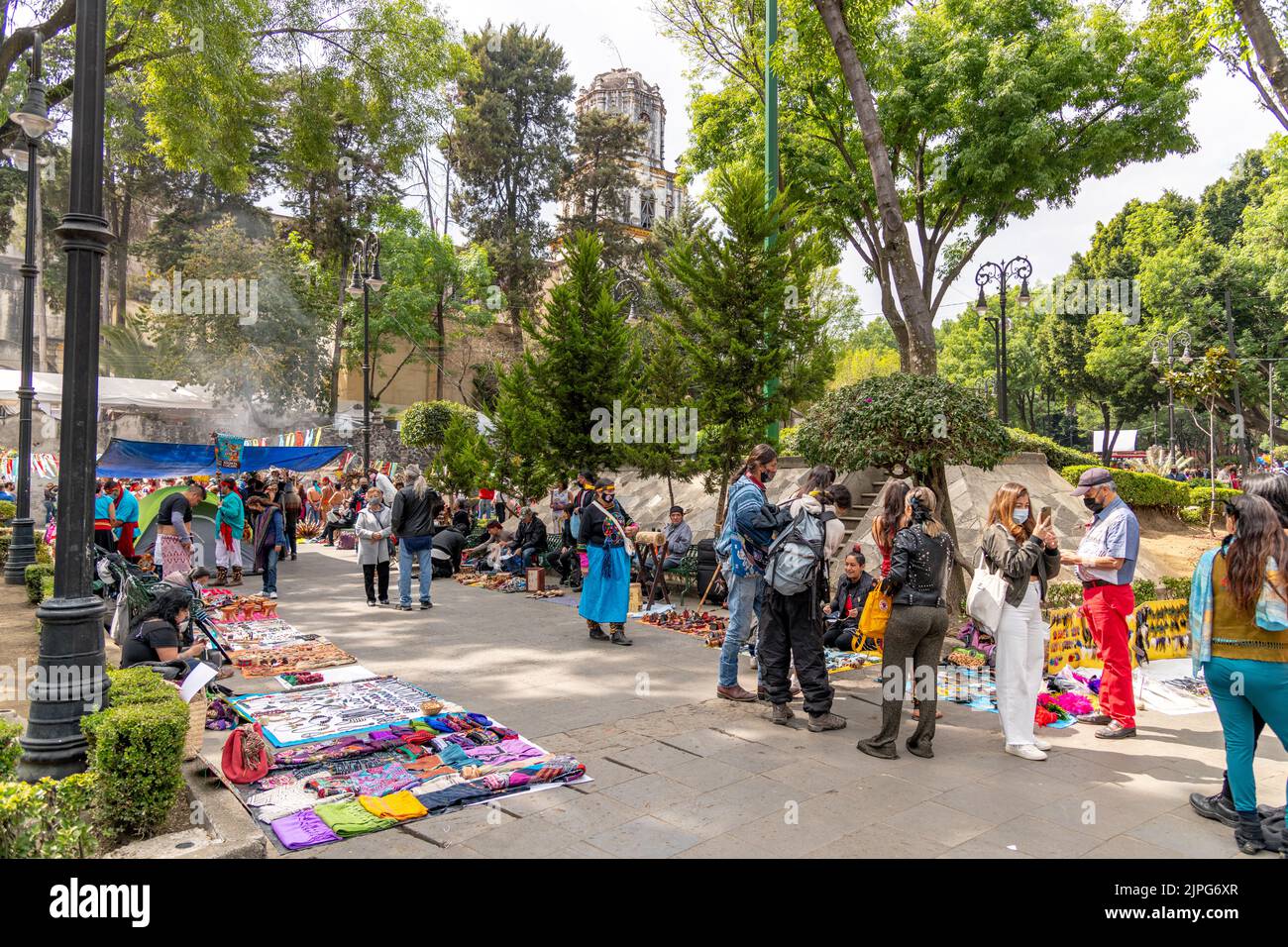 People at a market in Plaza Jardin Hidalgo in Coyoacan, Mexico City ...