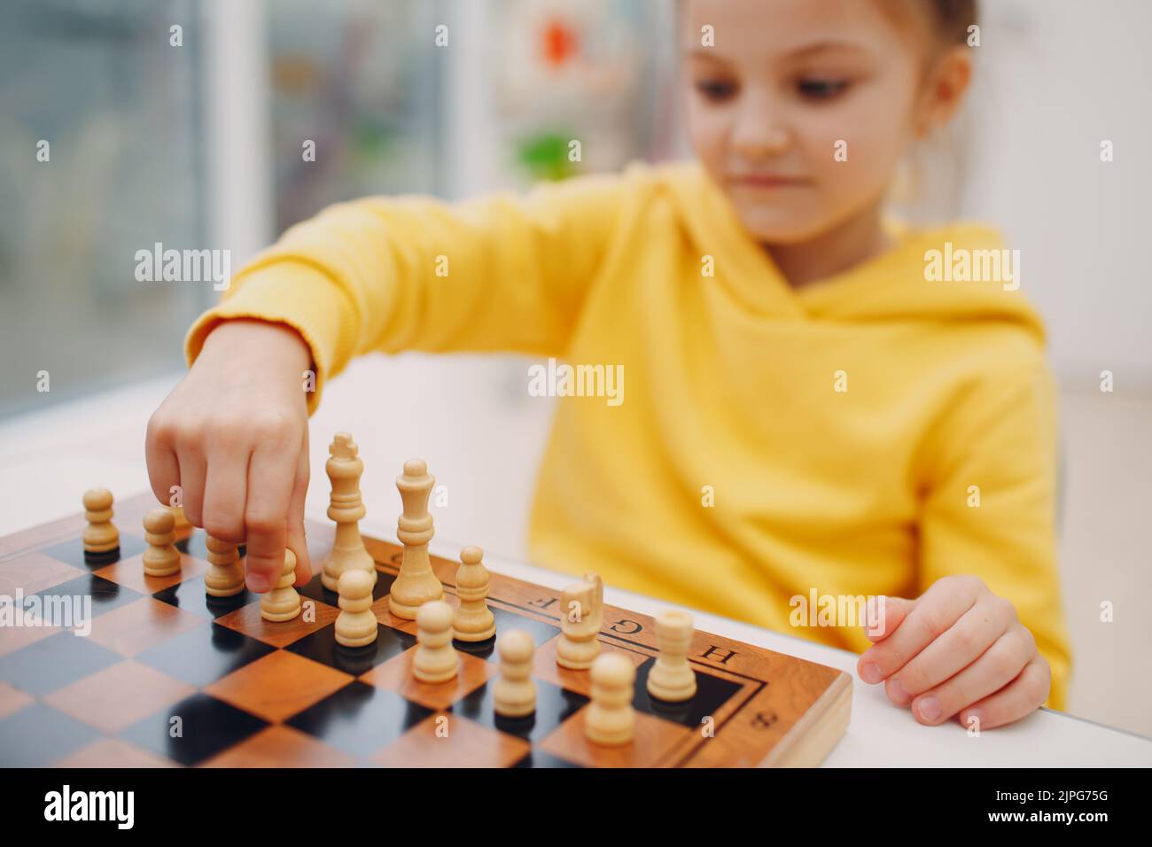 Little kids playing chess at kindergarten or elementary school Stock ...