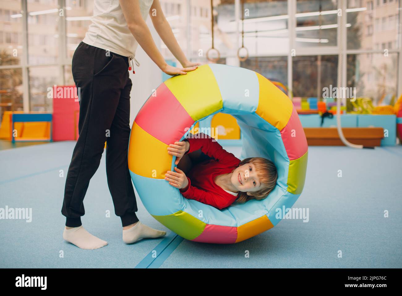 Kids playing in gym at kindergarten or elementary school. Children ...