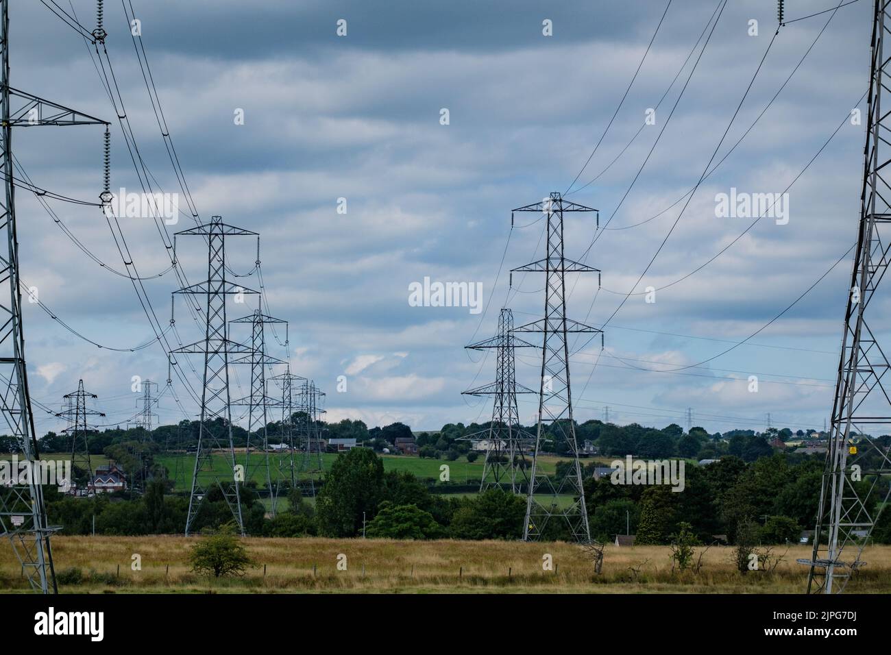 Pylon Lines spanning the countryside in North West England Stock Photo ...