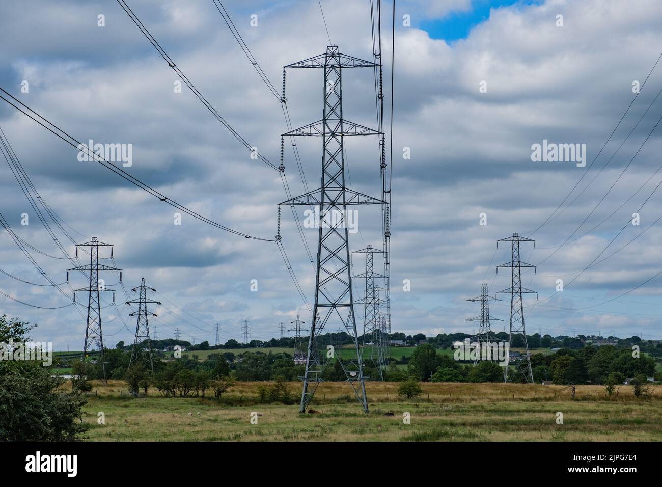 Pylon Lines spanning the countryside in North West England Stock Photo ...