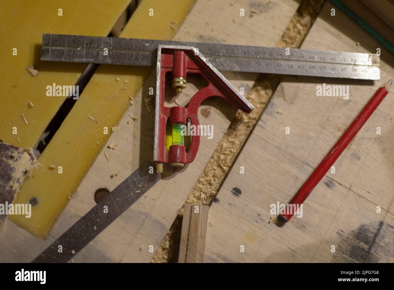 Line and level in workshop. Tool for measurements. Details of carpentry ...