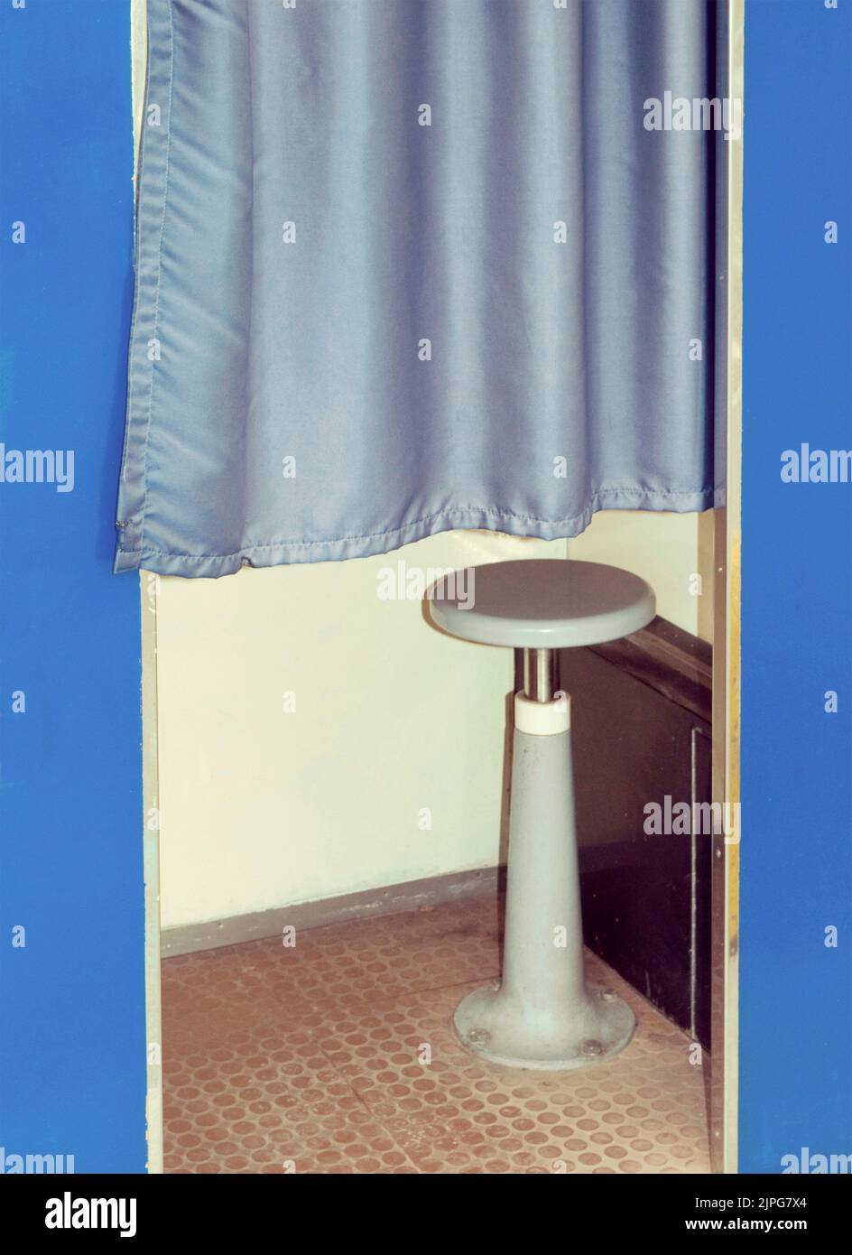 instant photo booth stool and curtain Stock Photo - Alamy