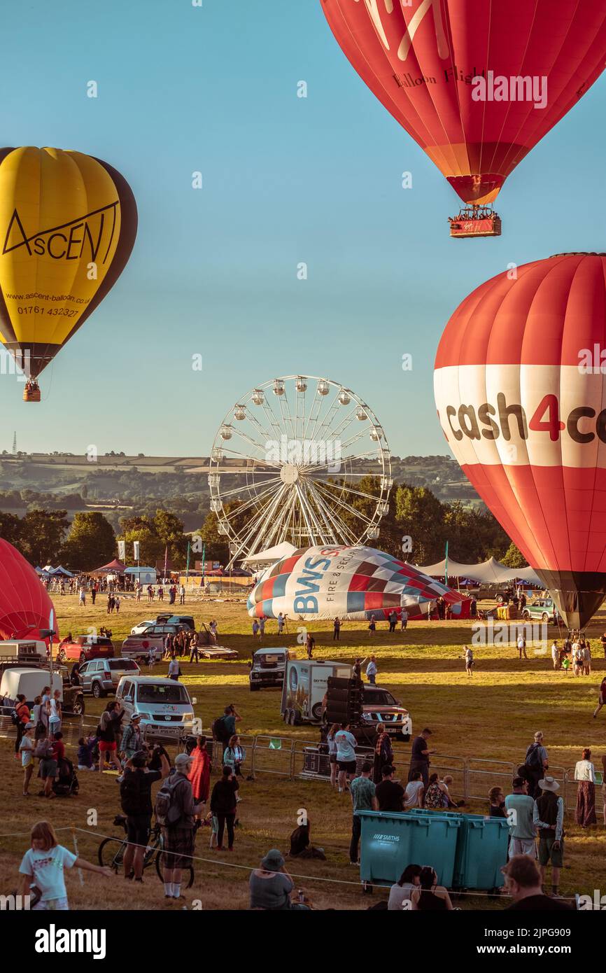Ferris wheels and red balloons Stock Photo - Alamy