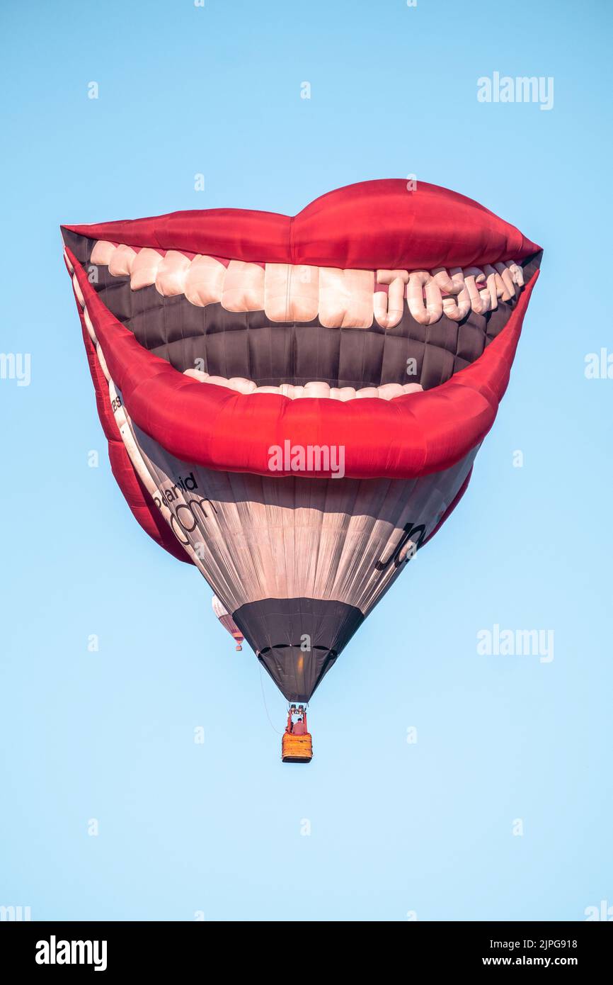 Red Smile hot air Balloon Stock Photo - Alamy