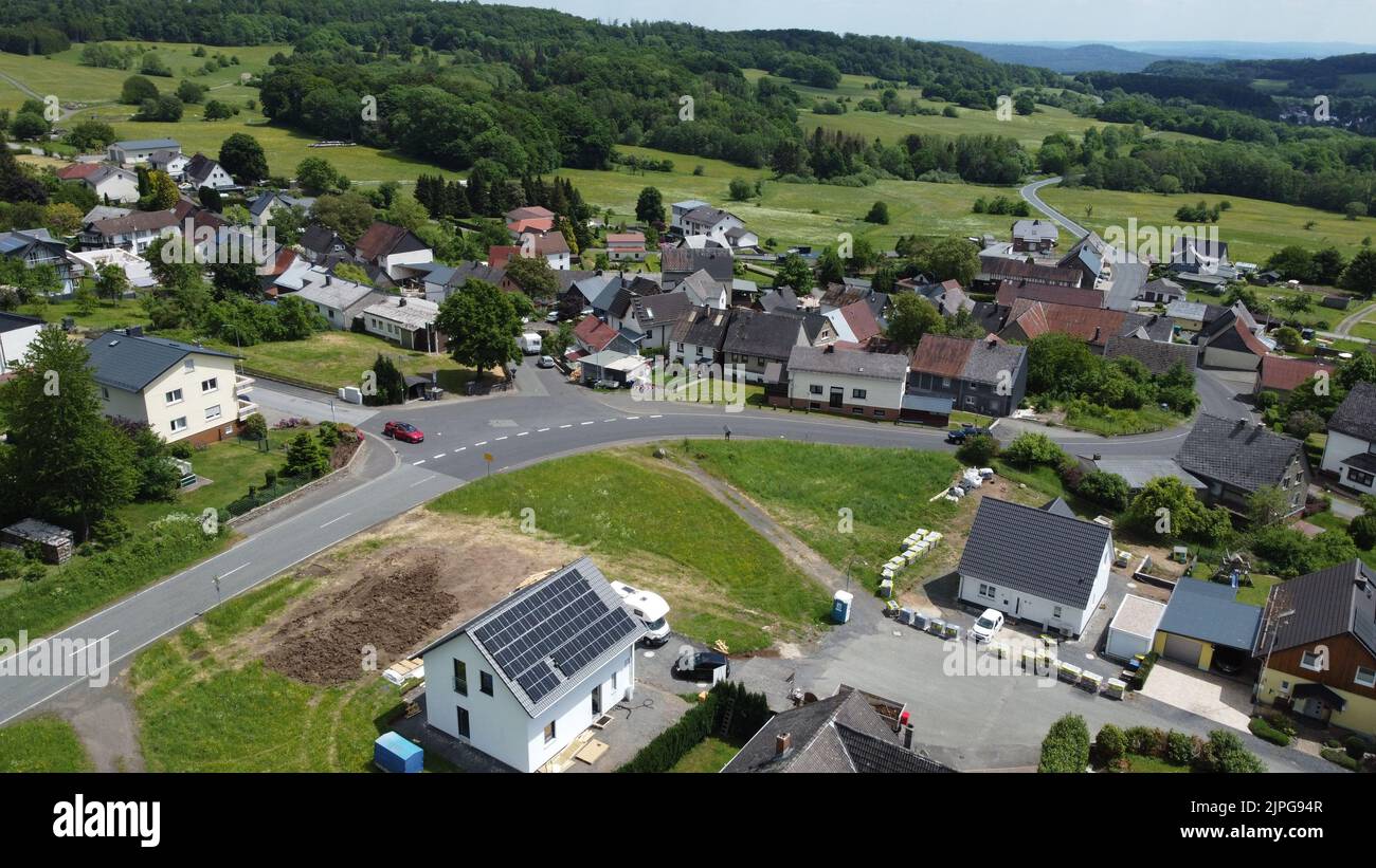 An aerial view of modern buildings surrounded by trees Stock Photo - Alamy