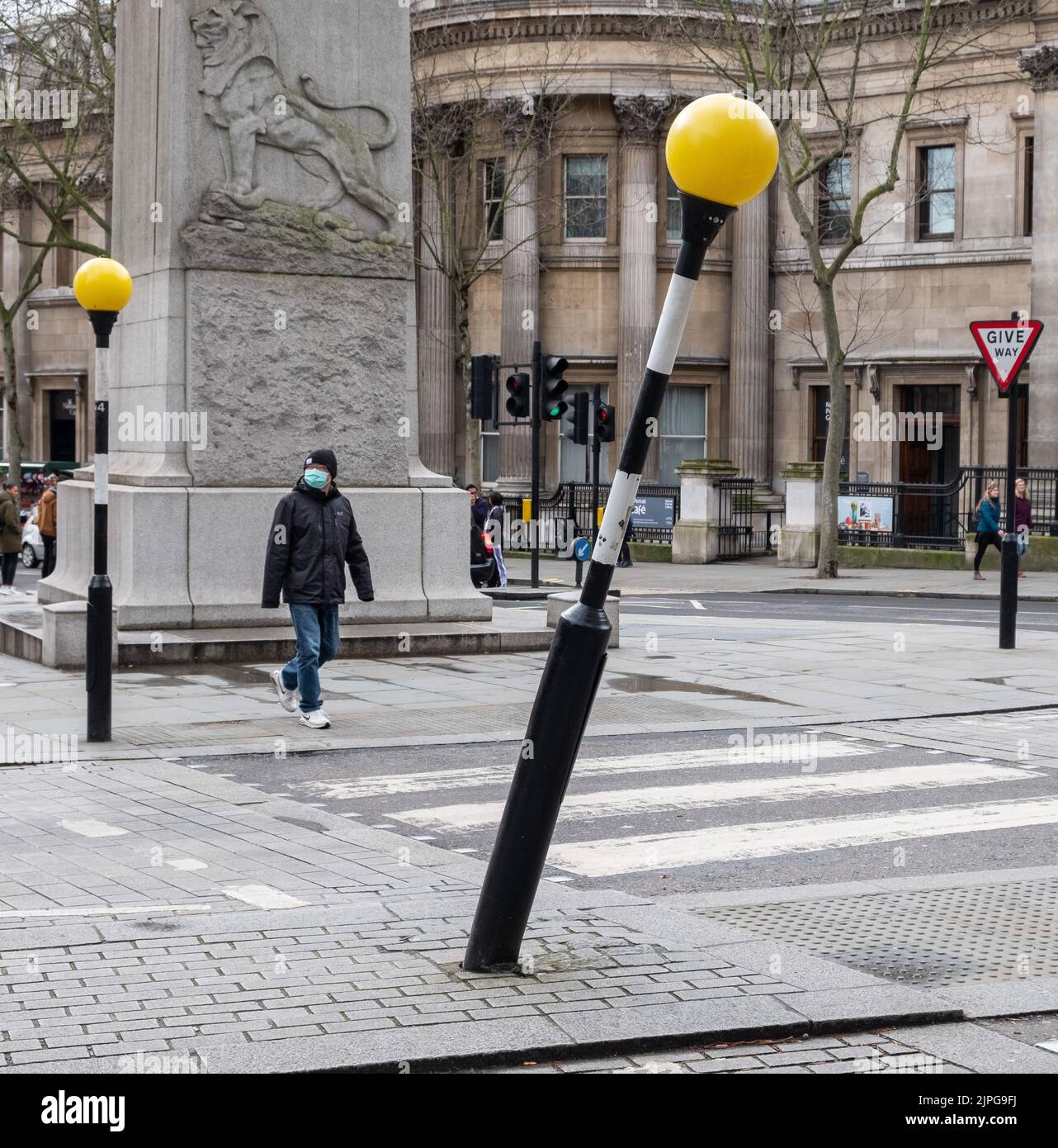 Leaning Belisha beacon at pedestrian crossing in St Martin's Lane Stock ...