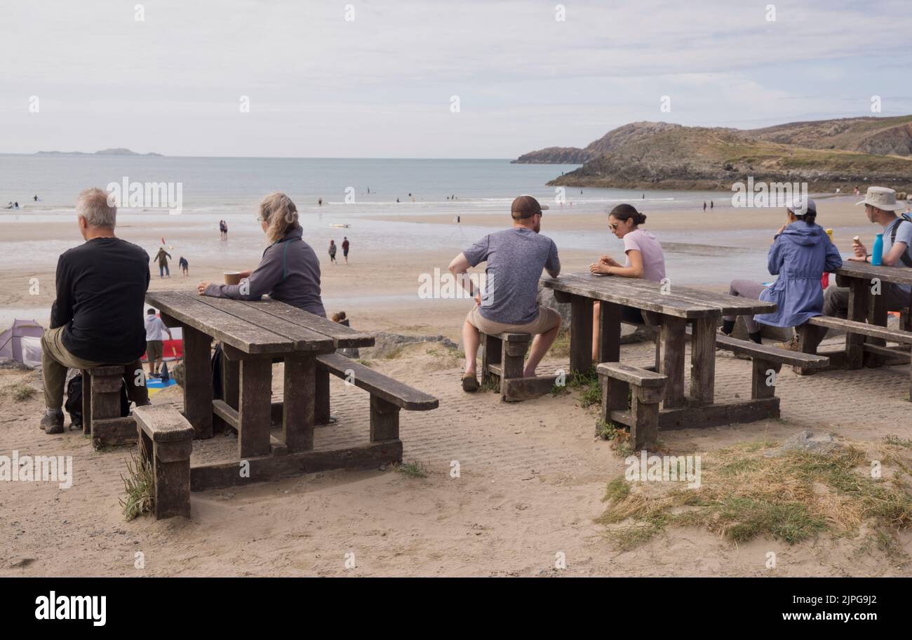 Tourists at the beach in Whitesands Bay; near St.Davids in Pembrokshire ...