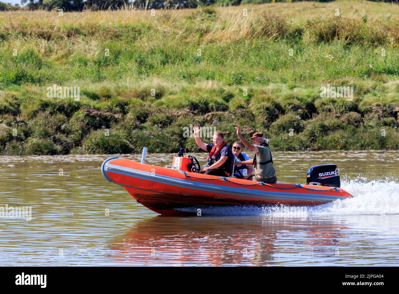Inflatable dinghy outboard motor hi-res stock photography and images ...