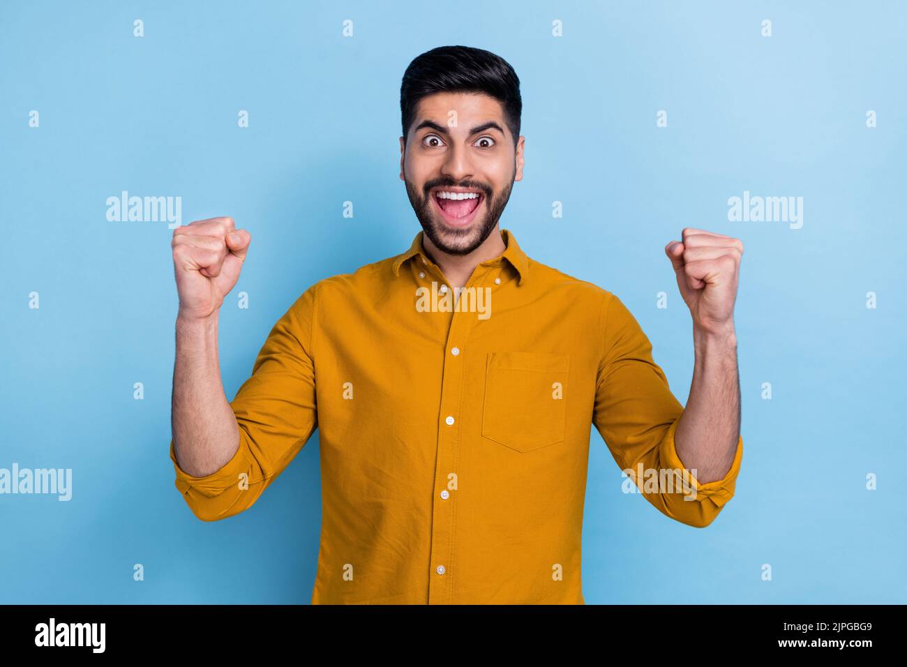 Portrait of positive overjoyed ecstatic person dressed yellow shirt ...