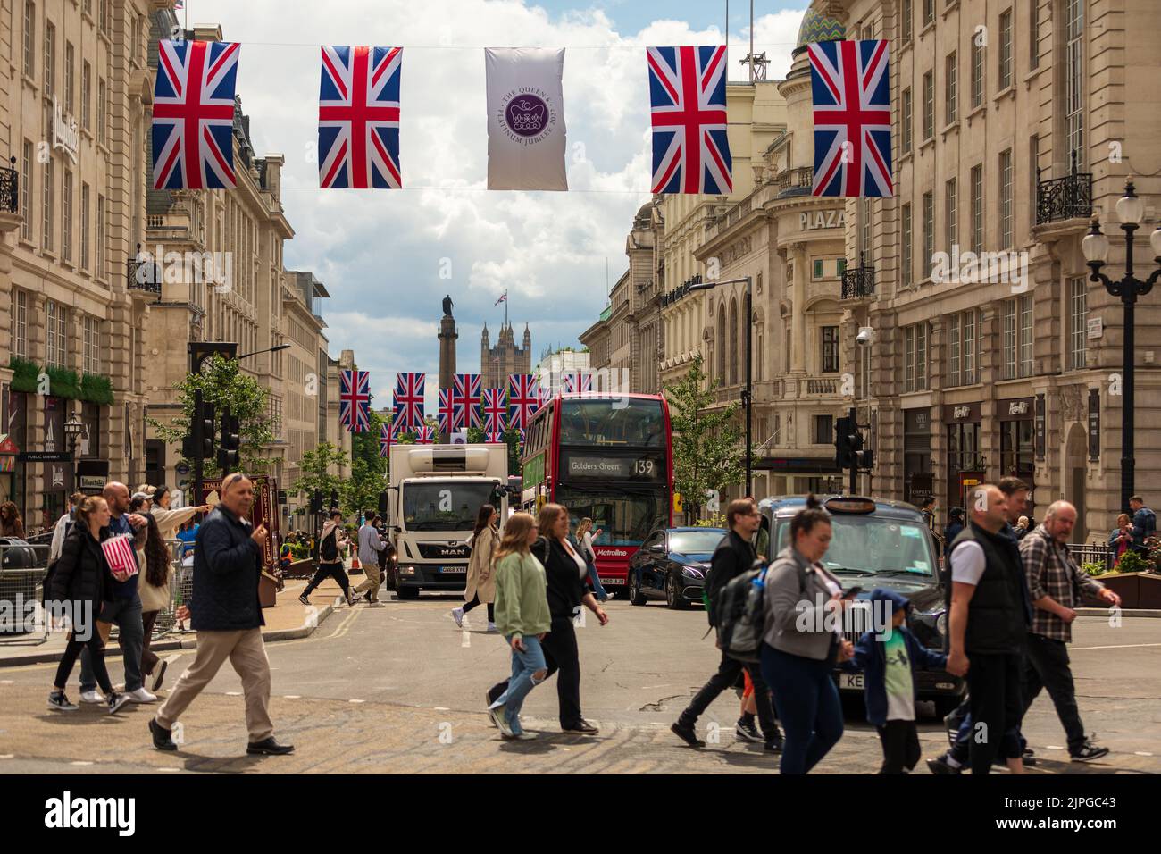 A beautiful shot of British flags hanging on the street before the ...