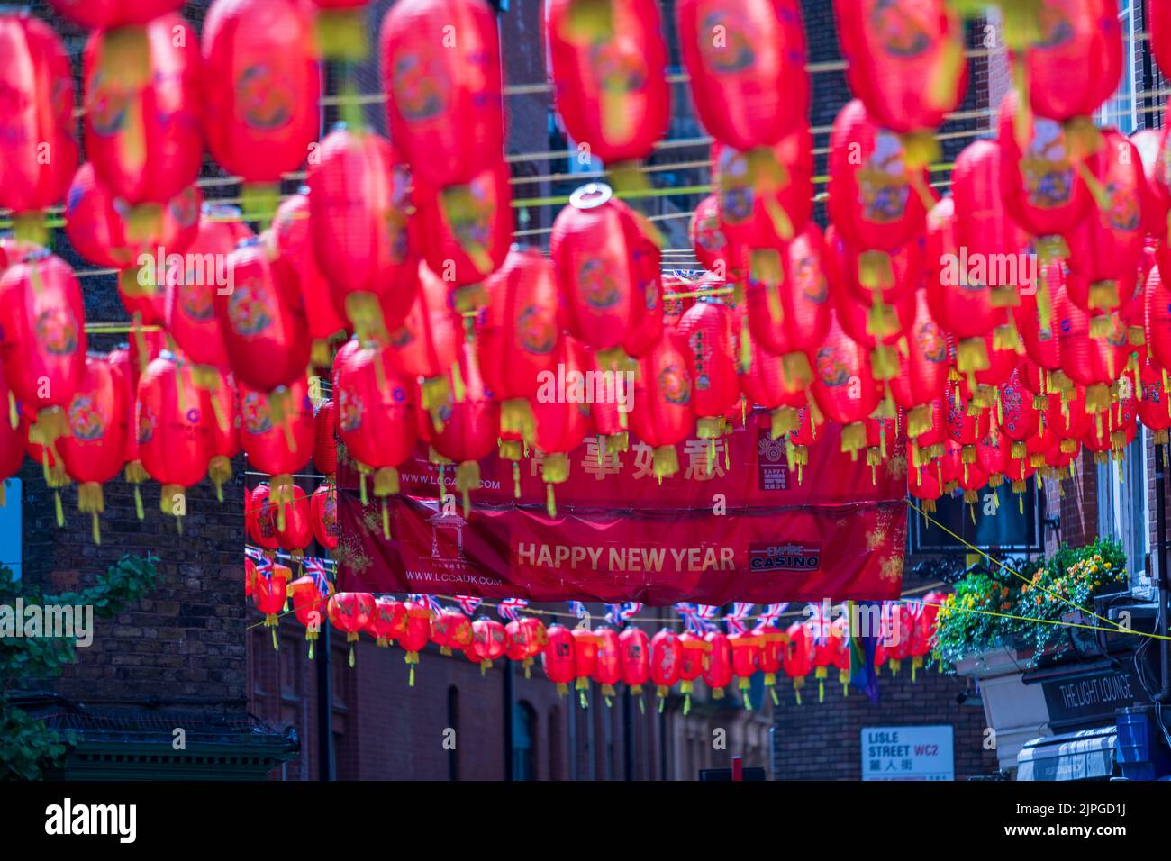 A shot of Chinese lanterns hanging on the streets of China town in London before the Queen ...