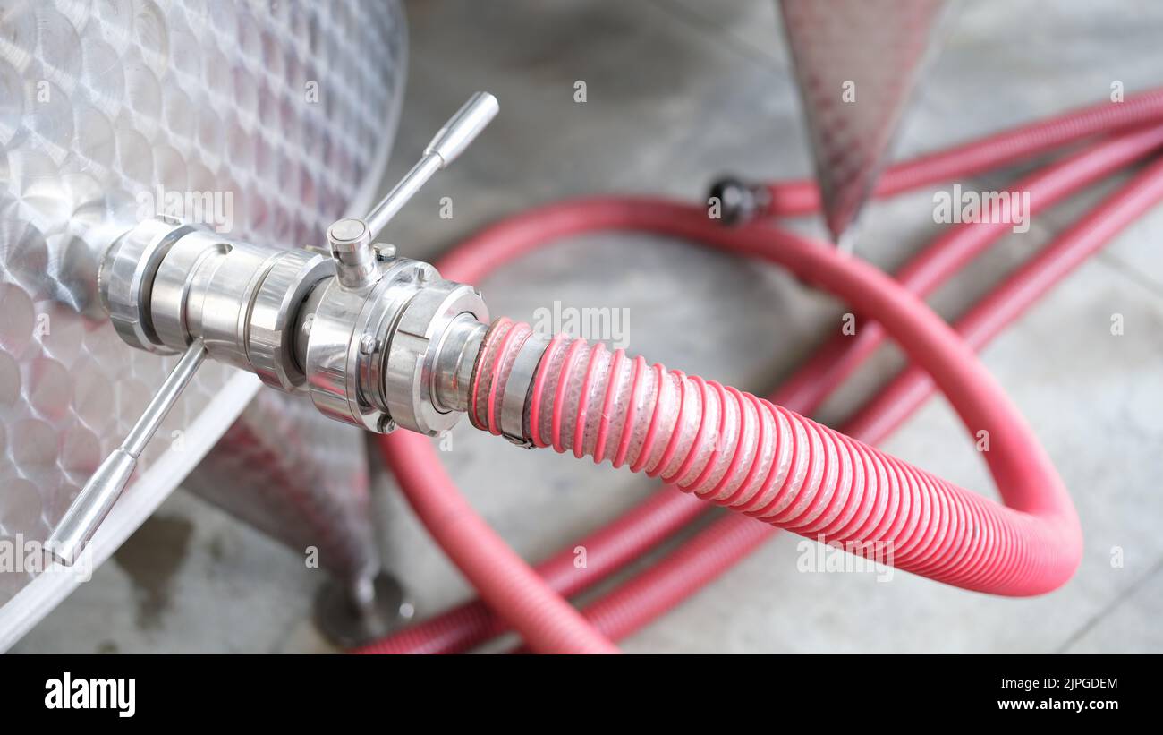 Stainless steel piping system with ball valves and hose Stock Photo - Alamy