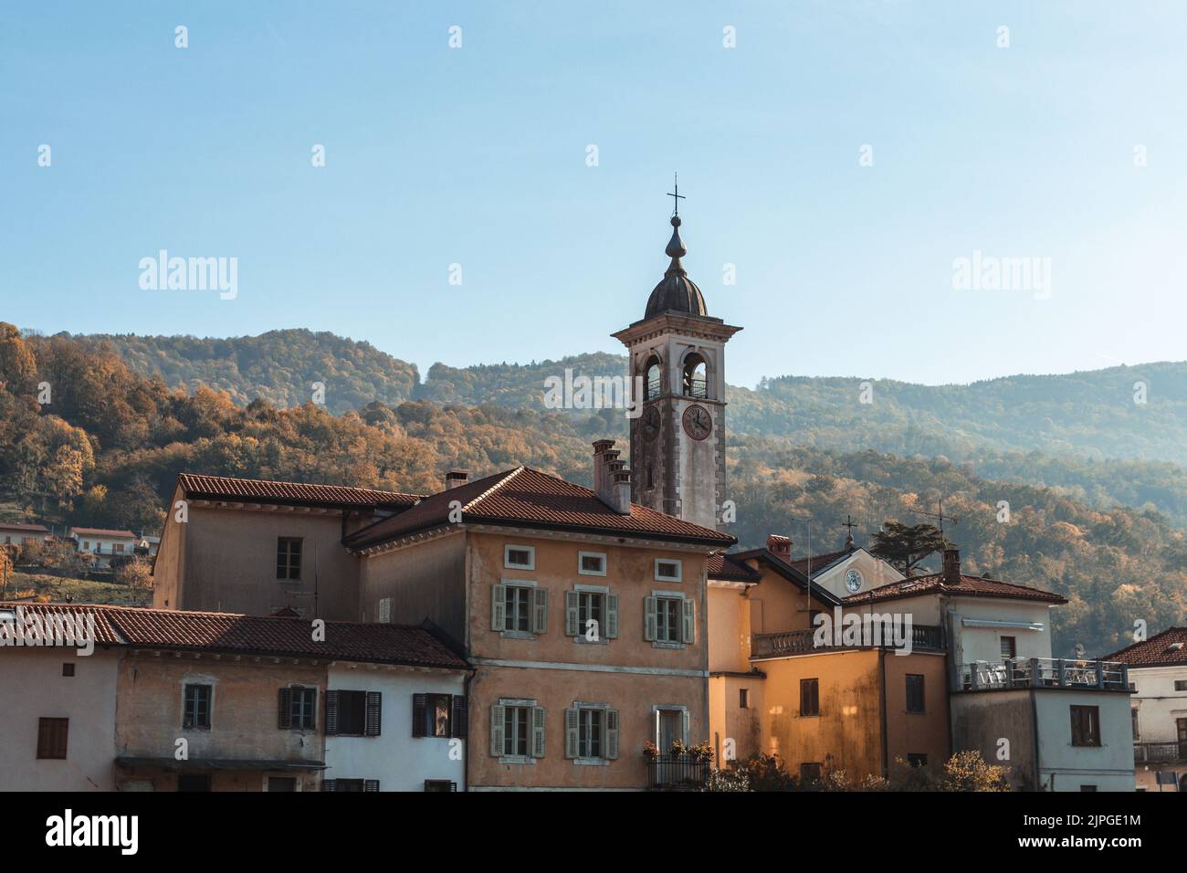 A beautiful shot of a Kanal town's church tower in Slovenia Stock Photo ...