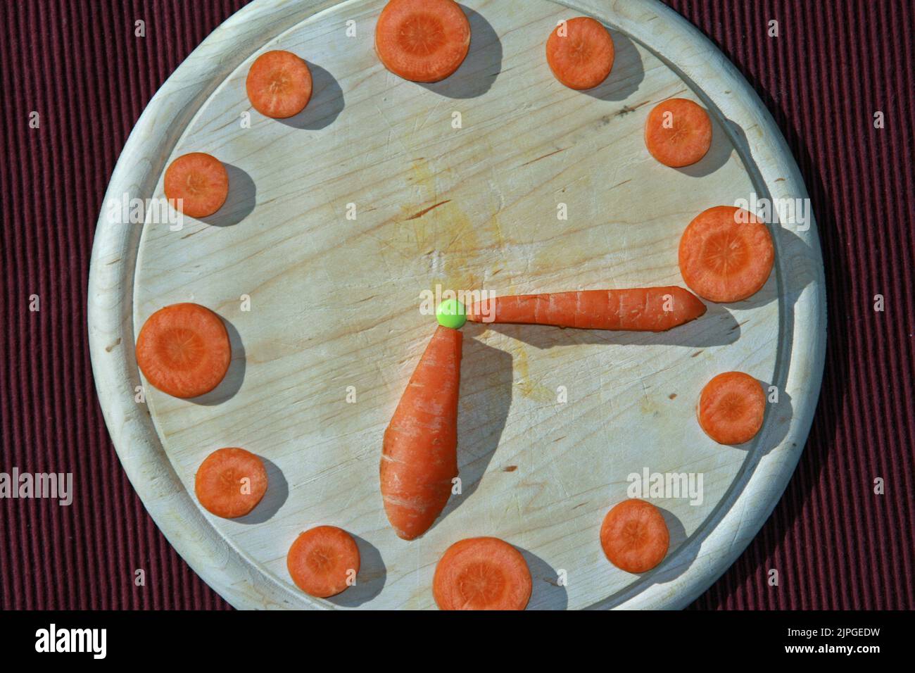 clock, carrot, snack, clocks, carrots, snacks Stock Photo - Alamy