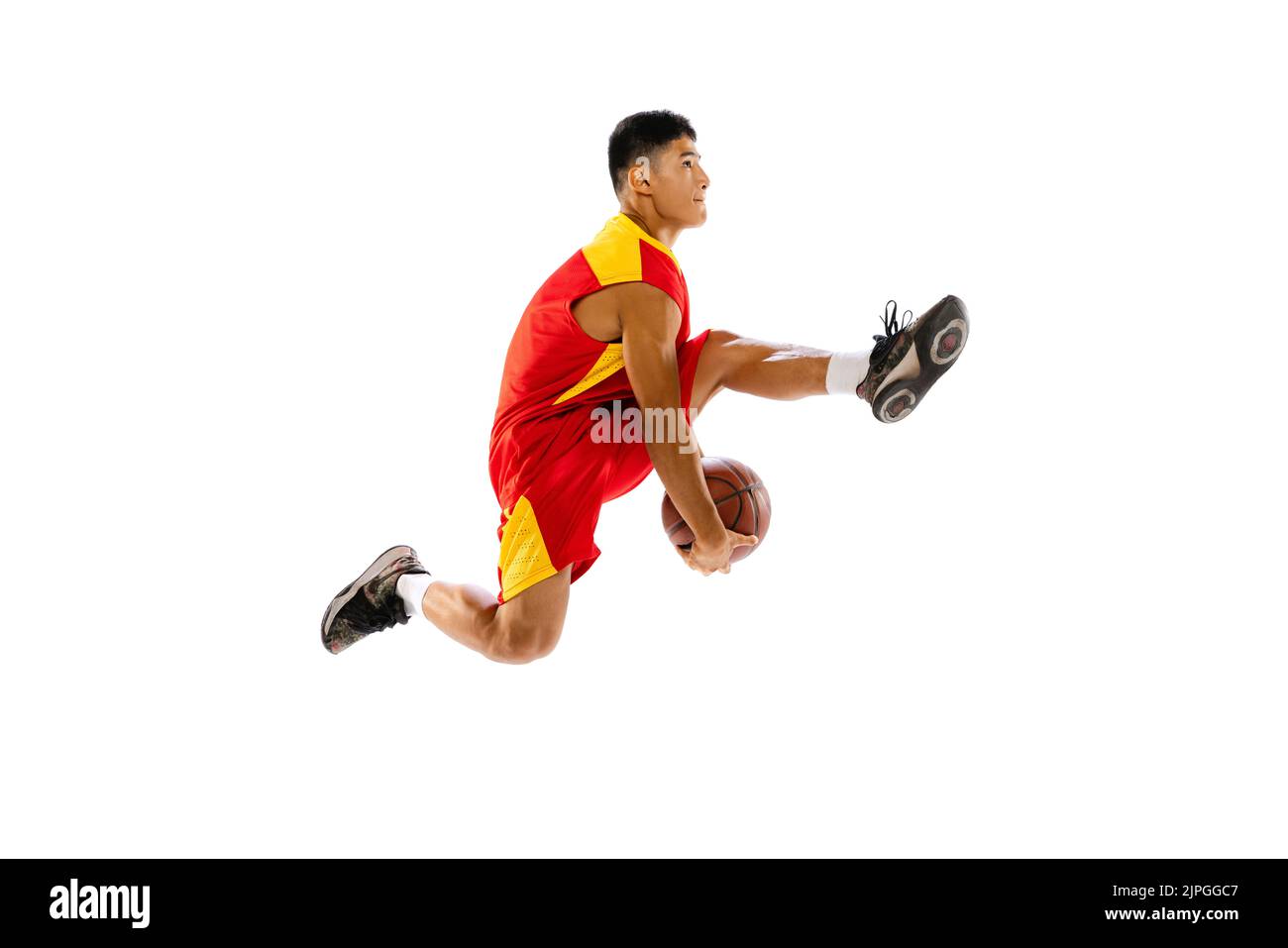 Portrait of young man, basketball player isolated over white studio ...