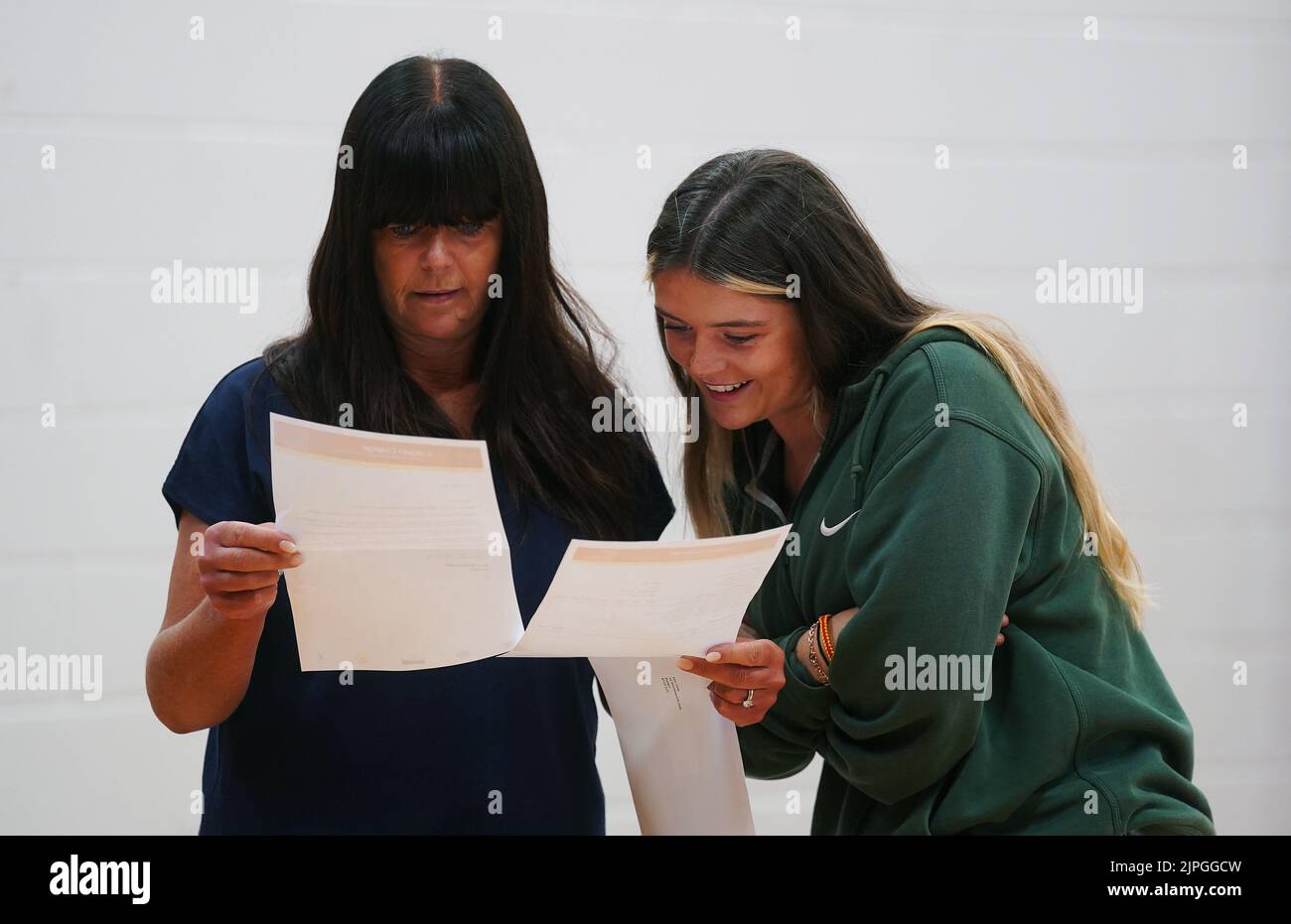 Mia Little (right) with her mother Lesley Little after opening her A ...