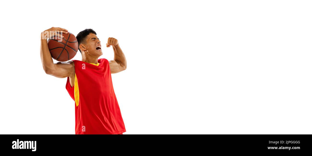 Portrait of young man, basketball player shouting in excitement ...