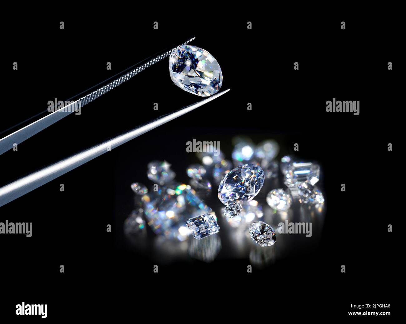 Diamonds black background tweezers hi-res stock photography and images ...