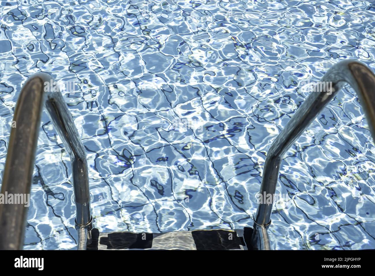 Detail of access to an outdoor swimming pool, sports and holidays Stock ...