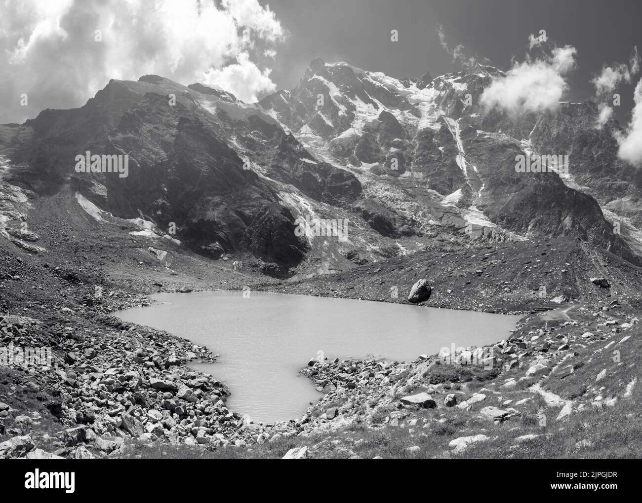 The Monte Rosa and Punta Gnifetti paks over the Lago delle Locce lake ...