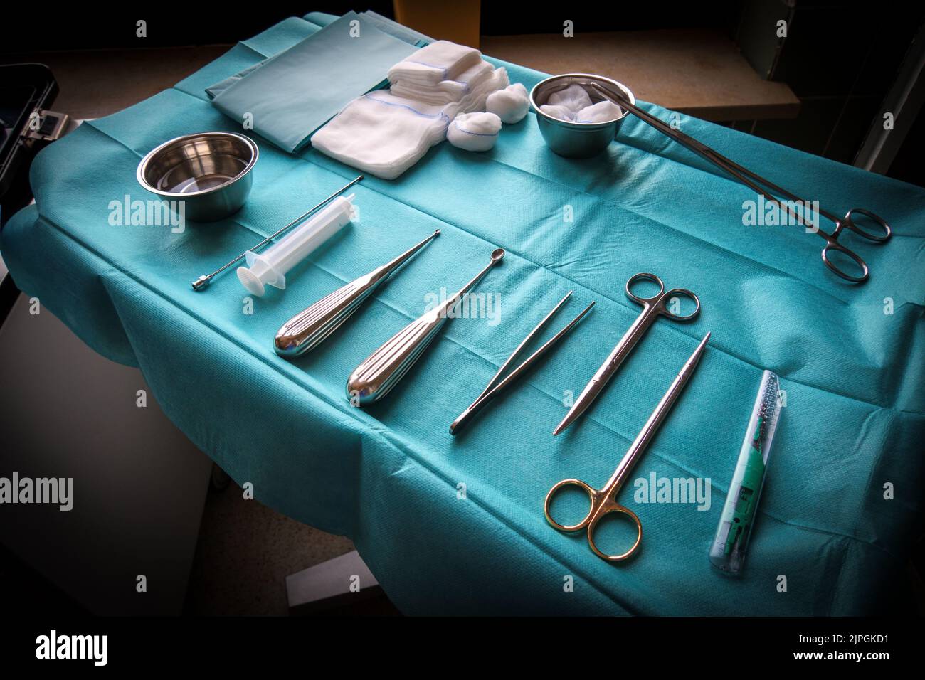 surgical instruments for abscess splitting are lying on an operating ...