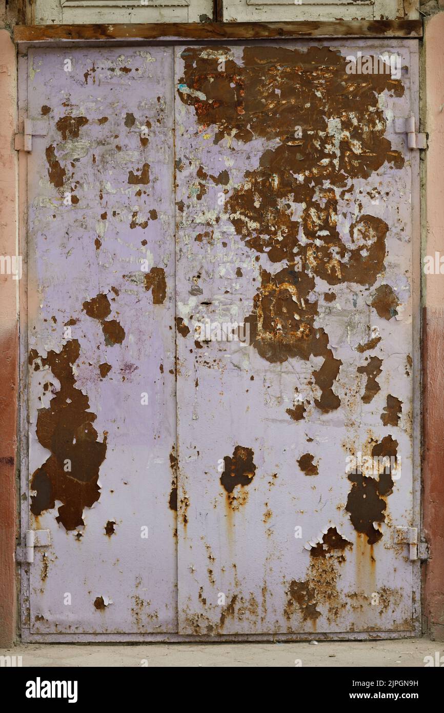 Old rusty heavy iron metal vintage painted shabby door Stock Photo - Alamy