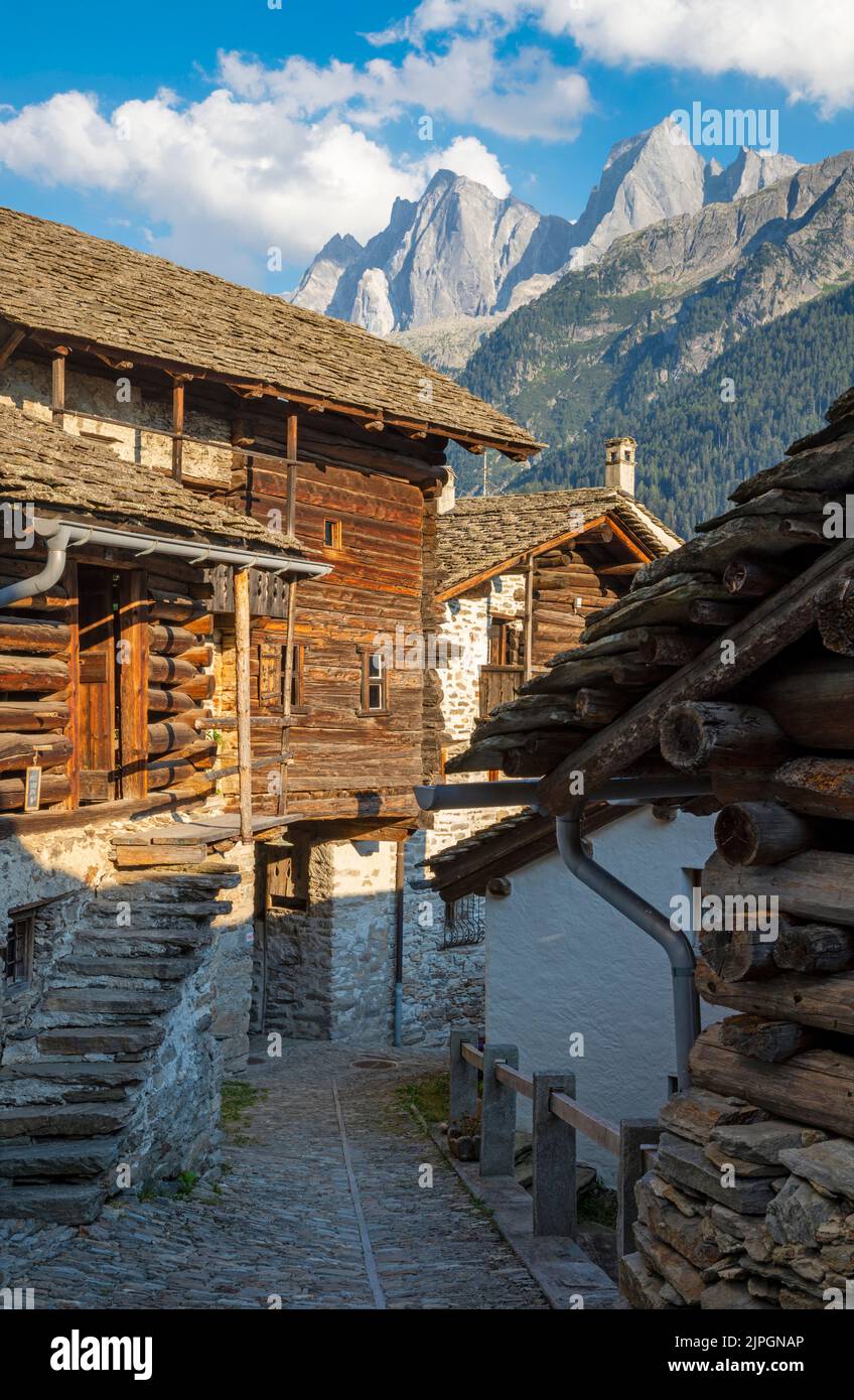 The Soglio village and Piz Badile and Pizzo Cengalo peaks in the ...