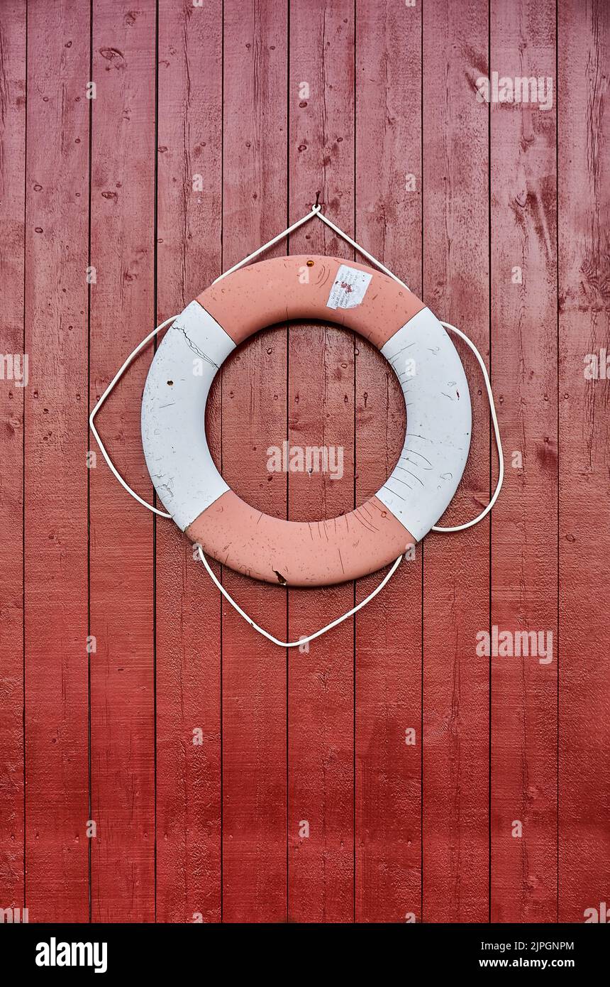 Minimalistic lifebuoy on a boat house, Godøy, Sunnmøre, Møre og Romsdal ...