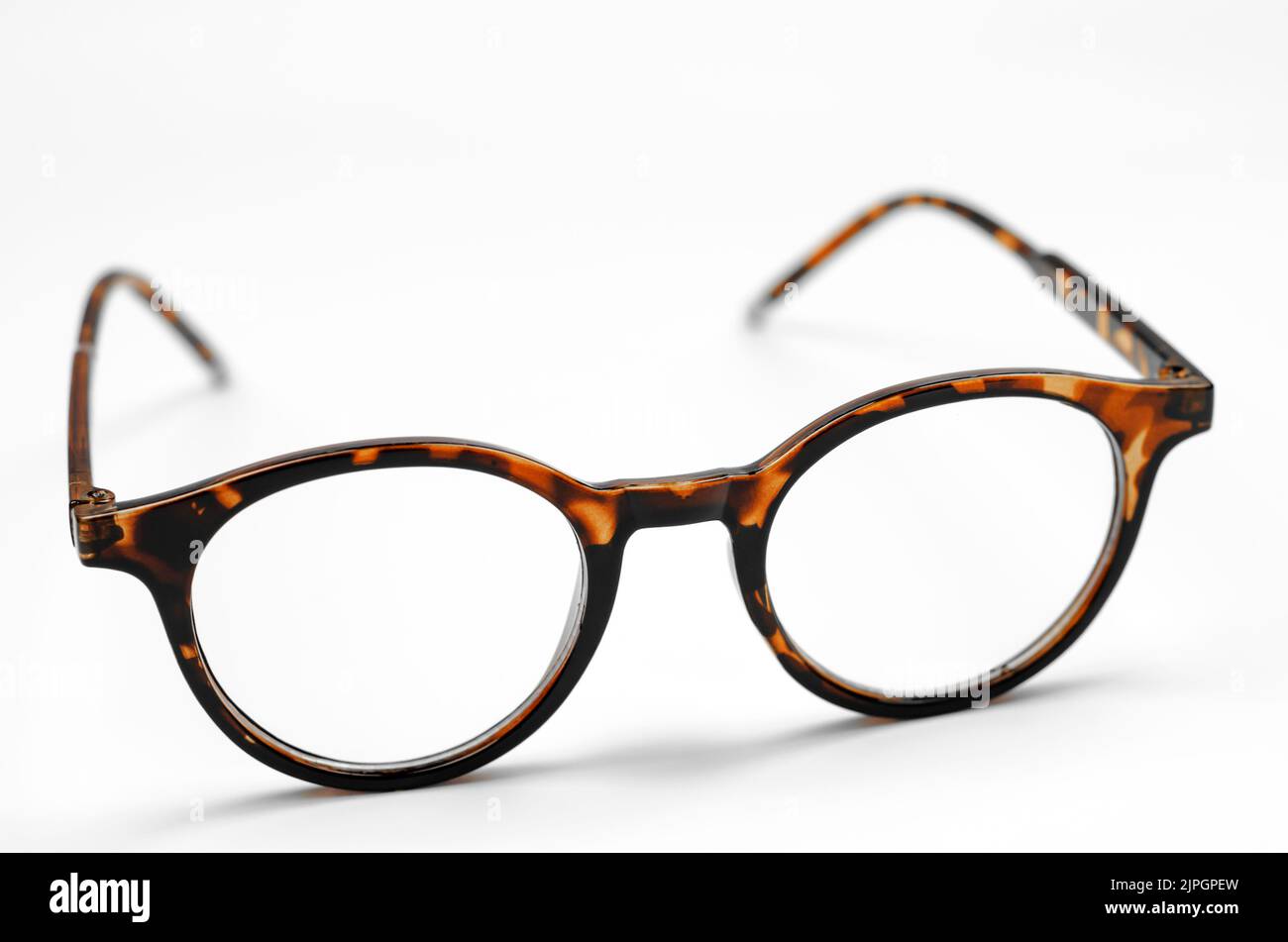 Stylish leopard-colored eyeglasses on a white background Stock Photo ...