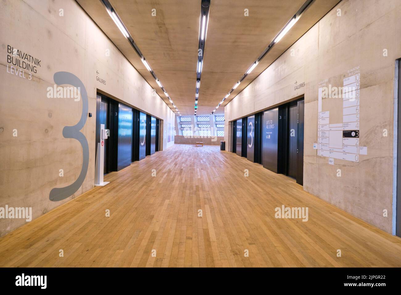 The floor 3, third floor hallway with black elevator bank. In the ...