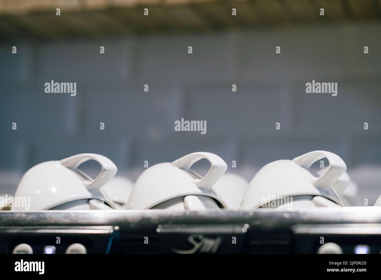 A Stack of Clean White Cups on Top of a Coffee Machine Stock Photo - Alamy
