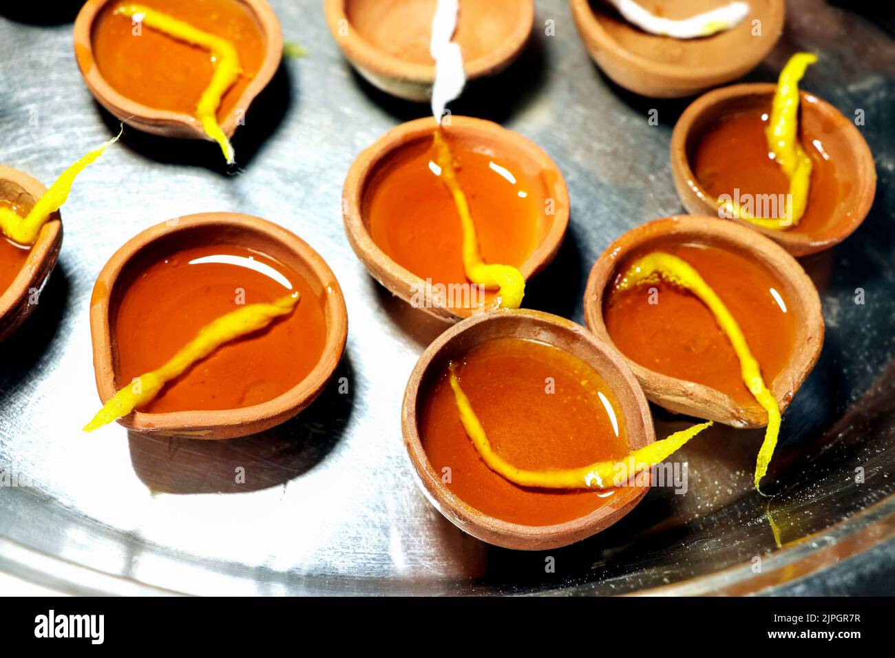 The traditional clay diya lamps lit during diwali celebration Stock ...